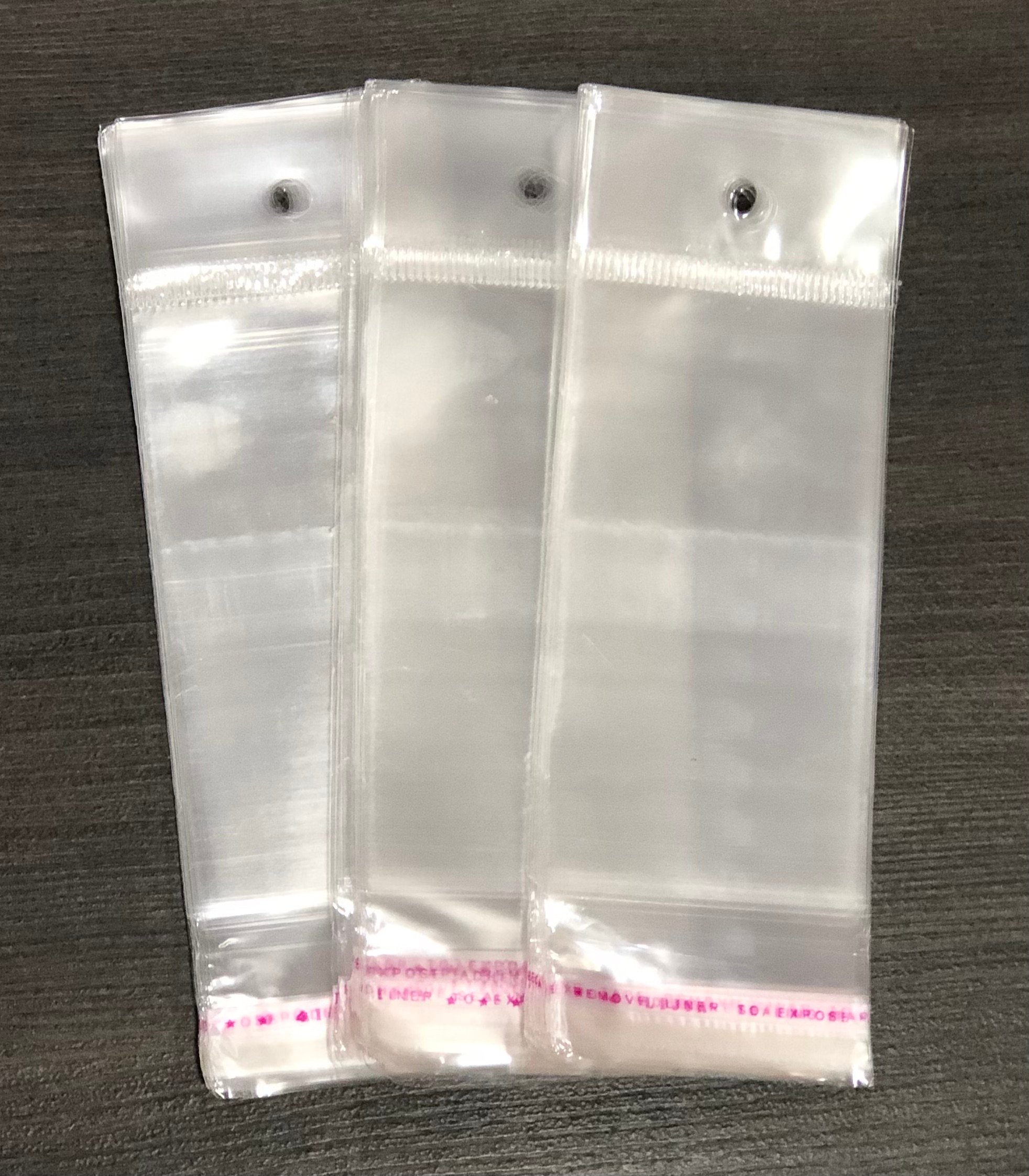 SACO TRANSPARENTE ADESIVADO COM SOLAPA 100un / | Aliança Embalagens